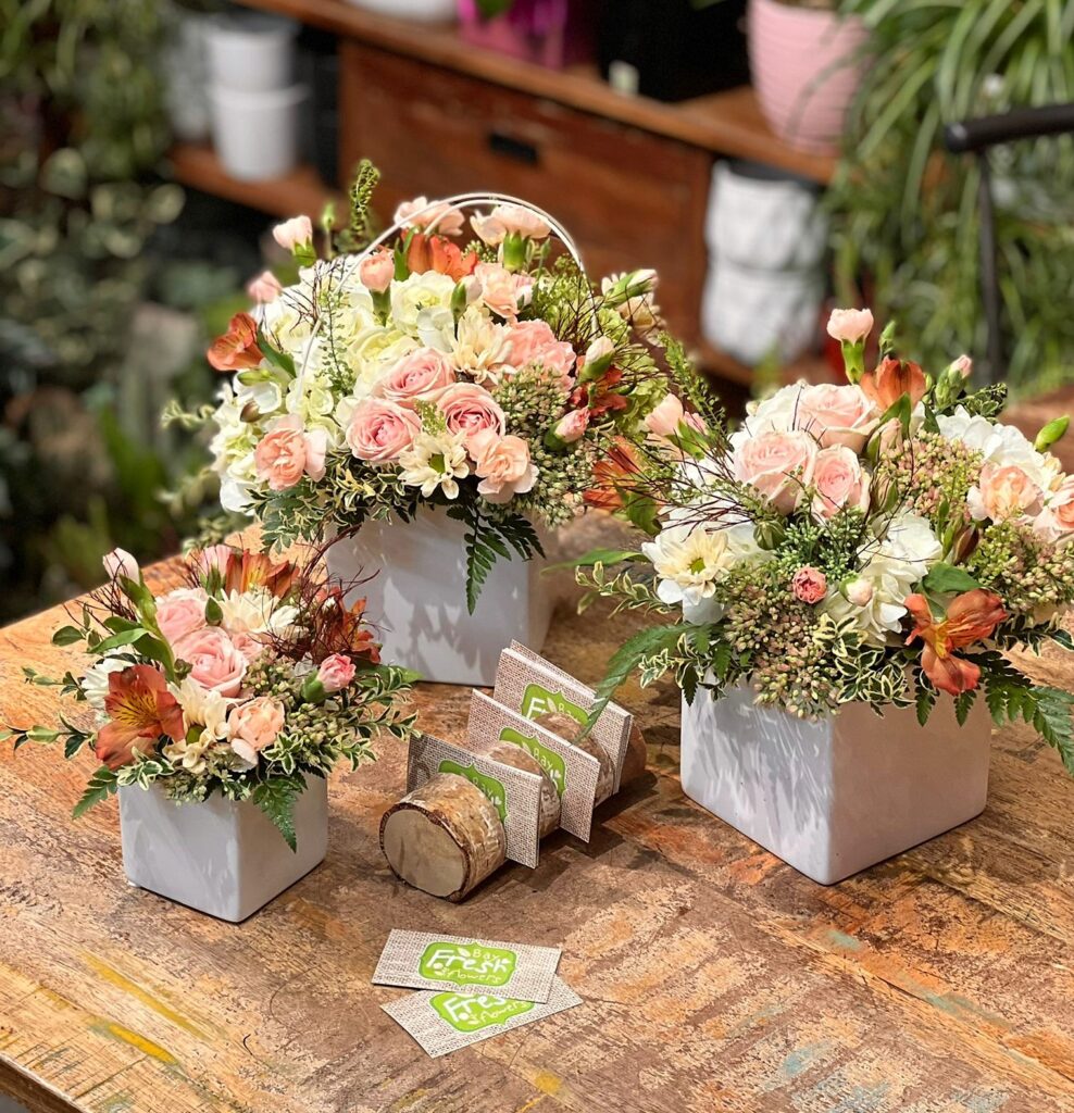 Delicate flower arrangement in a box. | bayfreshflowers.ca